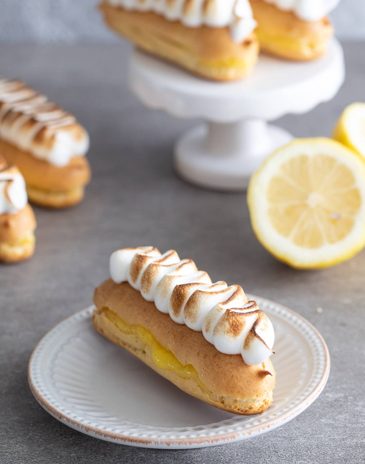Delicious Lemon Meringue Eclairs - A Red Spatula